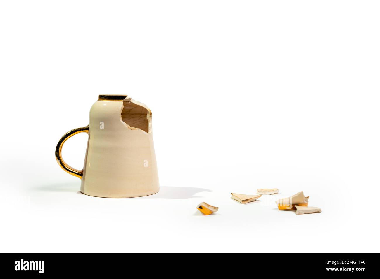 Broken tea cup isolated on white background. Cracked coffee mug and ...