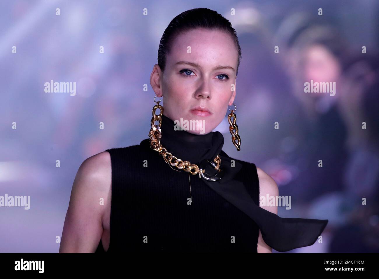 A model wears a creation for Sacai fashion collection during Women's ...