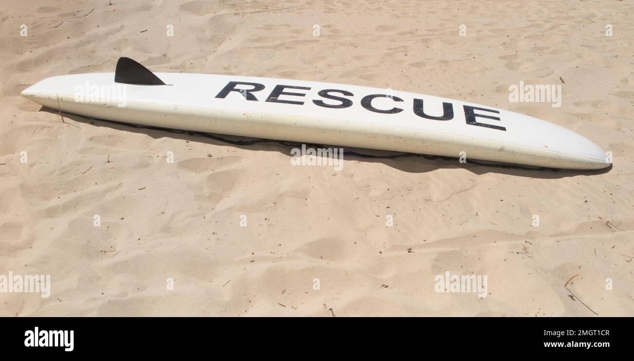on sand beach surf board for rescue lifeguard Stock Photo - Alamy