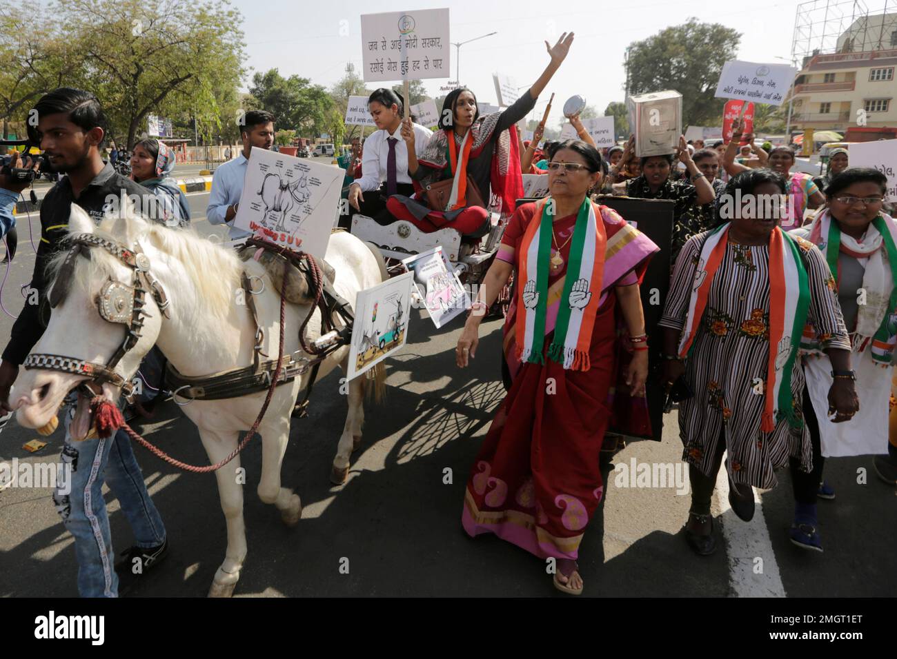 Supporters of the women's wing of India's main opposition Congress ...