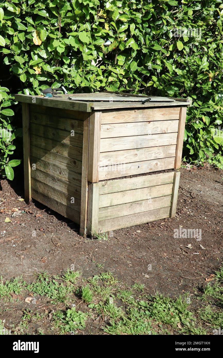 wood compost bin in family garden home Stock Photo - Alamy