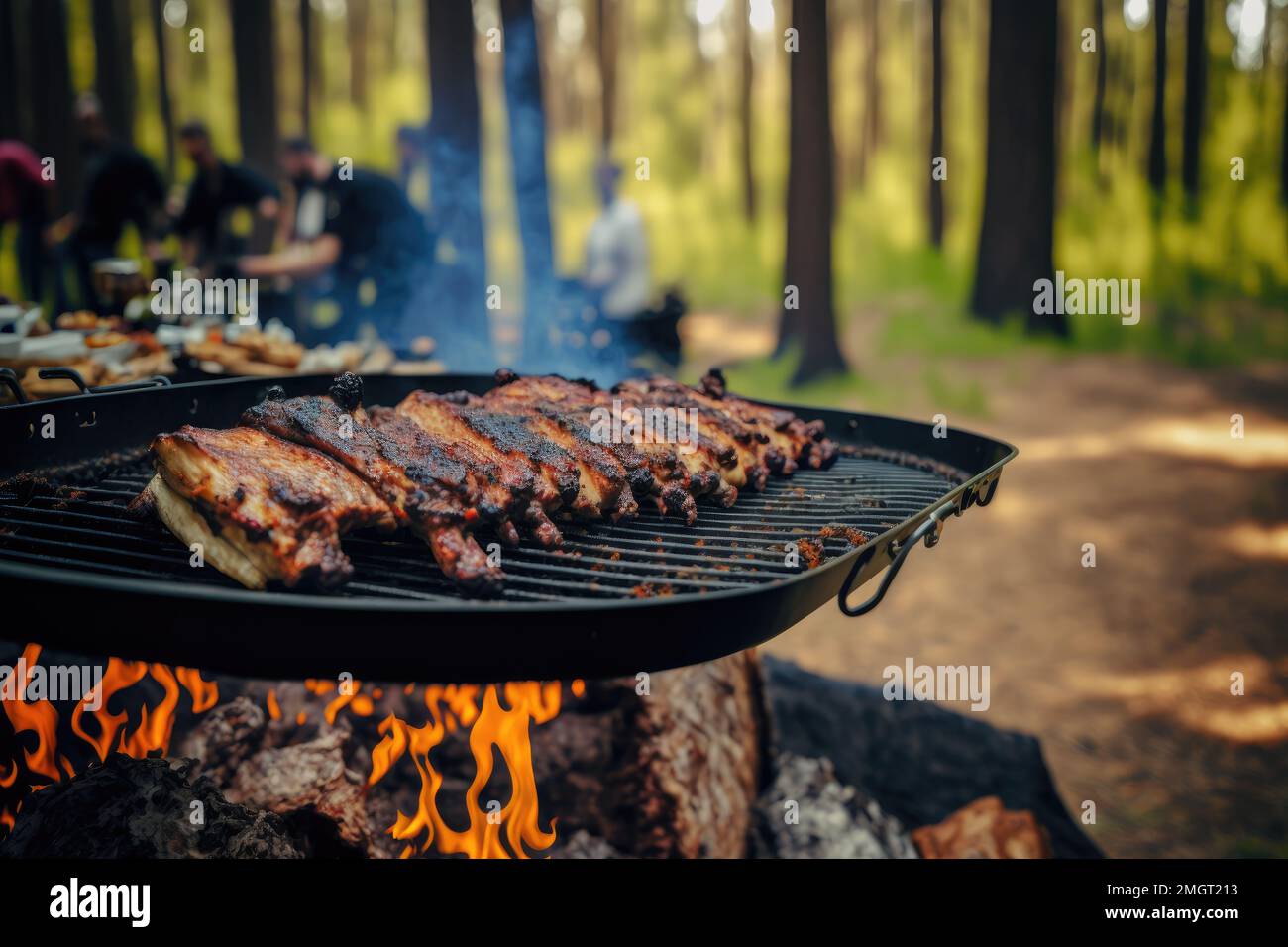A closeup shot of beef meat grilling on a mesh on fire outdoors in ...