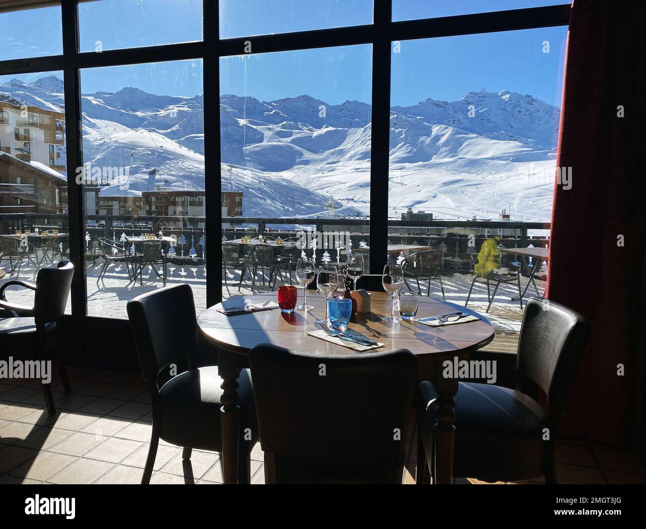 view from restaurant window of snow mountains of ski resort Stock Photo ...