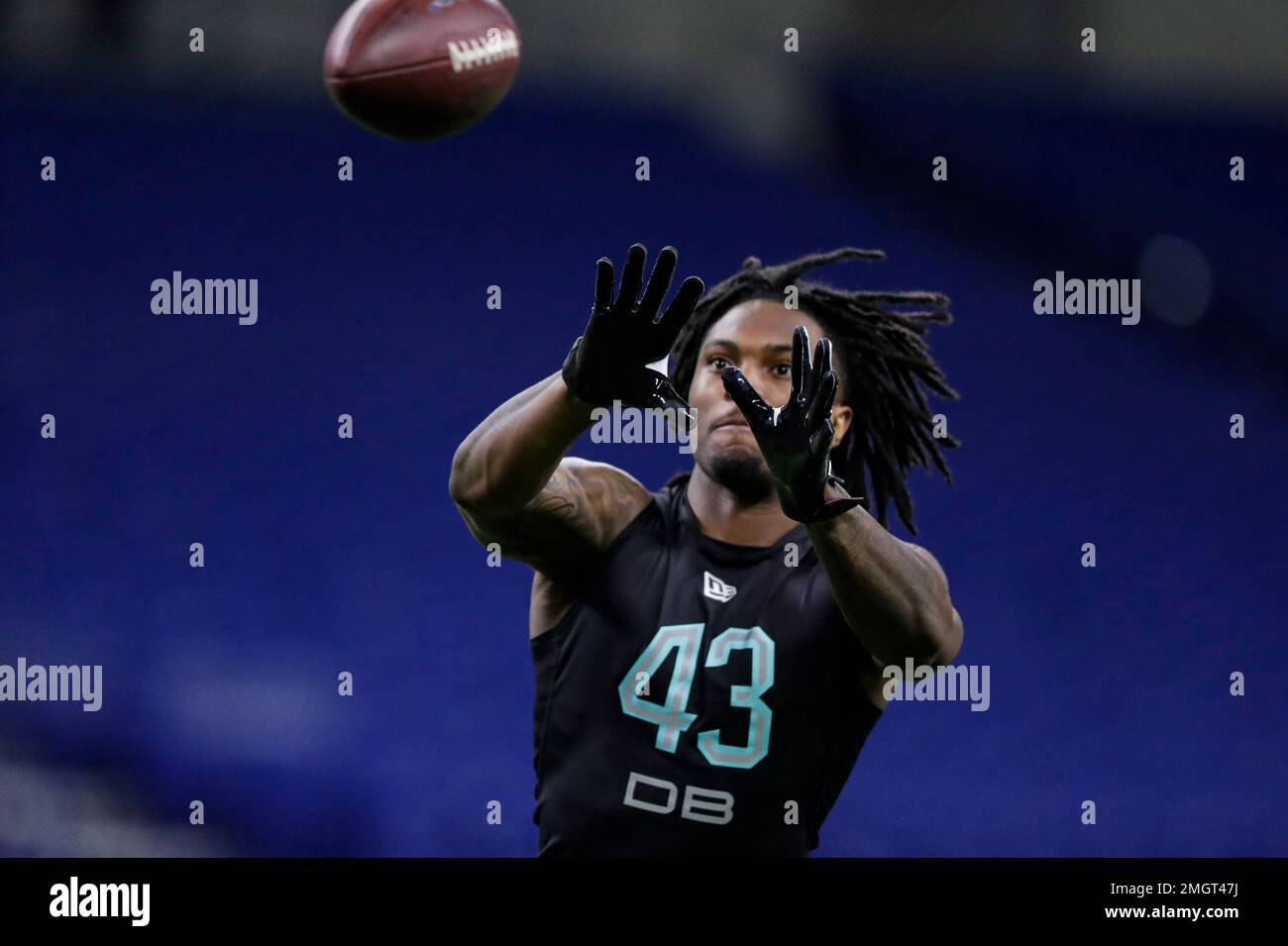 Arkansas defensive back Kamren Curl runs a drill at the NFL football ...