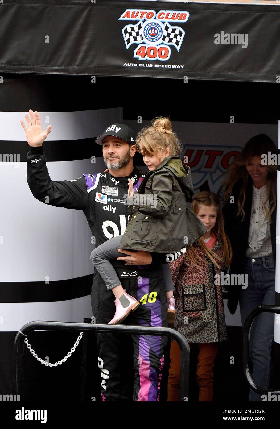 Jimmie Johnson is introduced to the crowd during activities as he ...