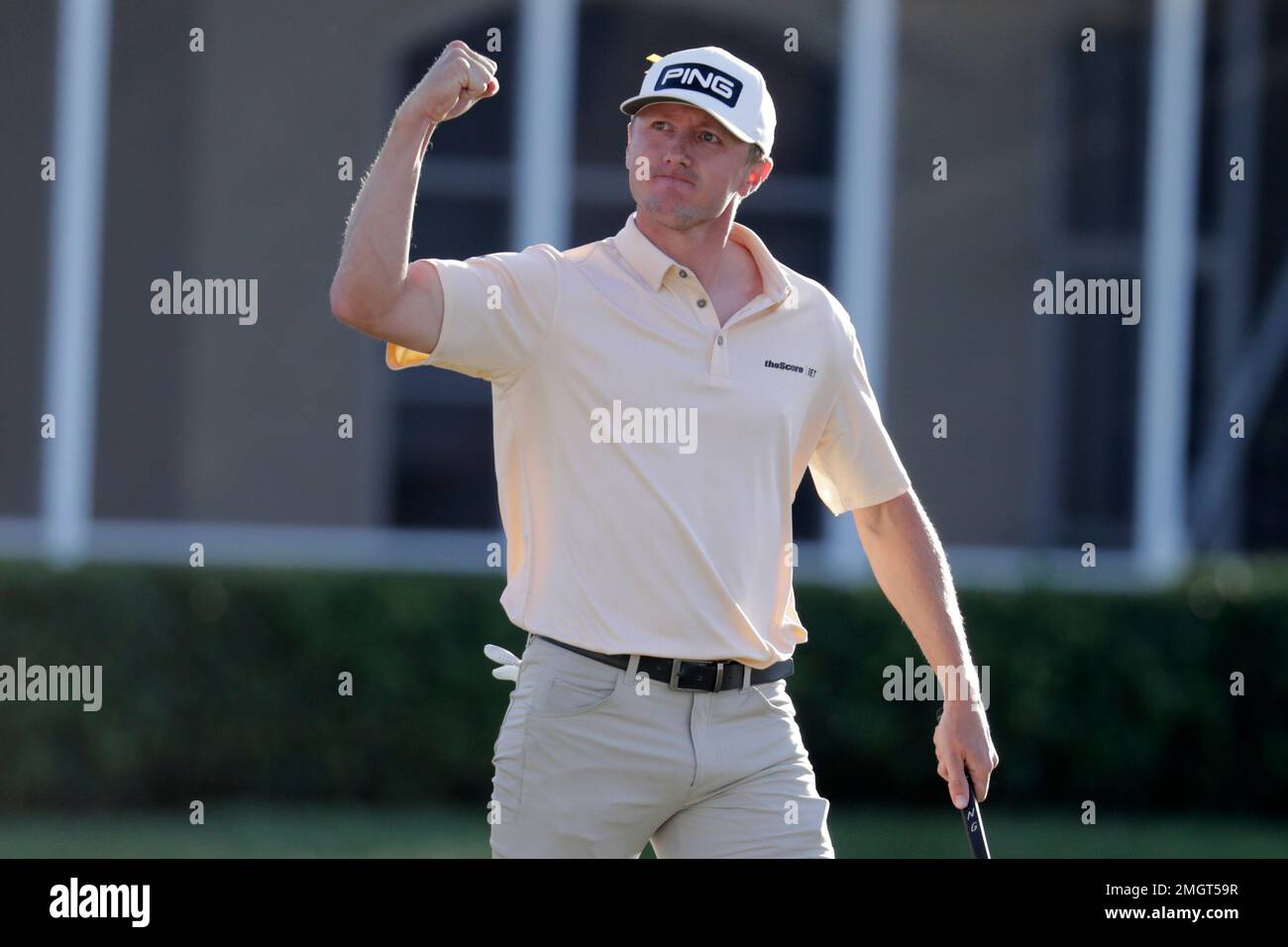 Mackenzie Hughes of Canada reacts after a birdie putt on the 17th hole ...