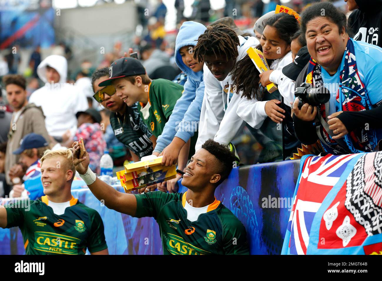 South Africa's Angelo Davids takes photos with fans during the Los ...