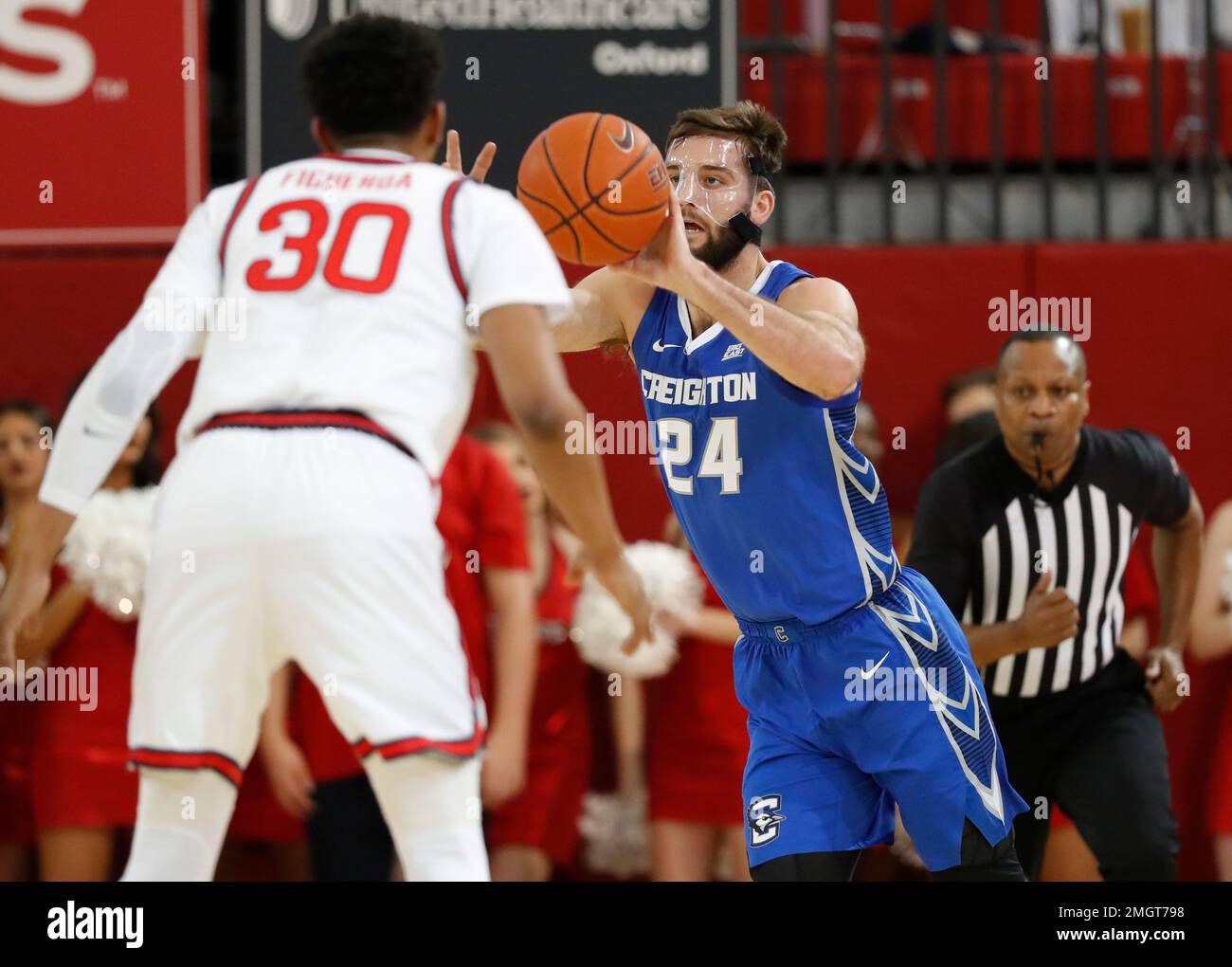 Creighton guard Mitch Ballock (24) passes as St. John's guard LJ ...