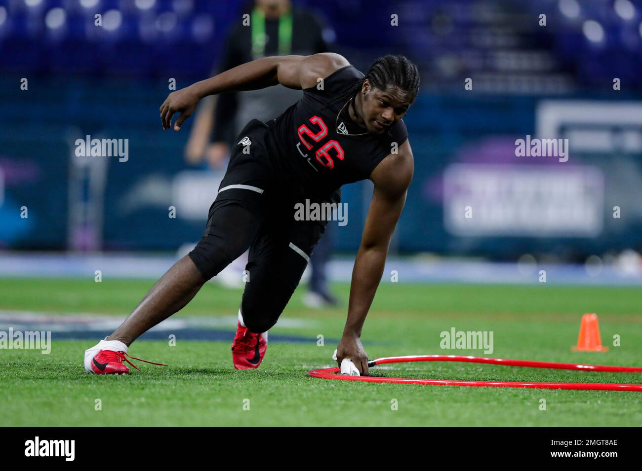 Miami defensive lineman Jonathan Garvin runs a drill at the NFL ...