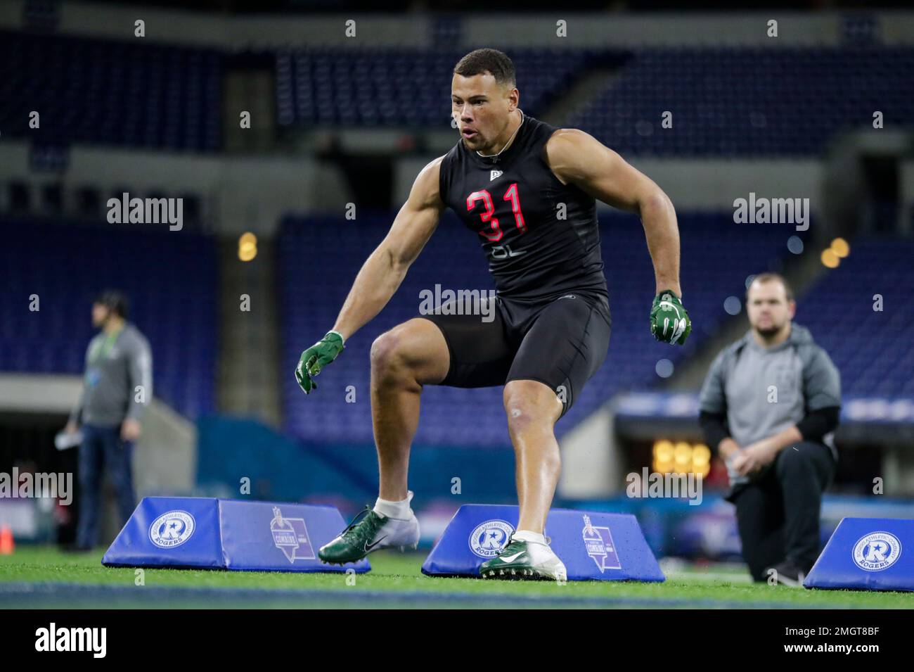 Charlotte defensive lineman Alex Highsmith runs a drill at the NFL ...