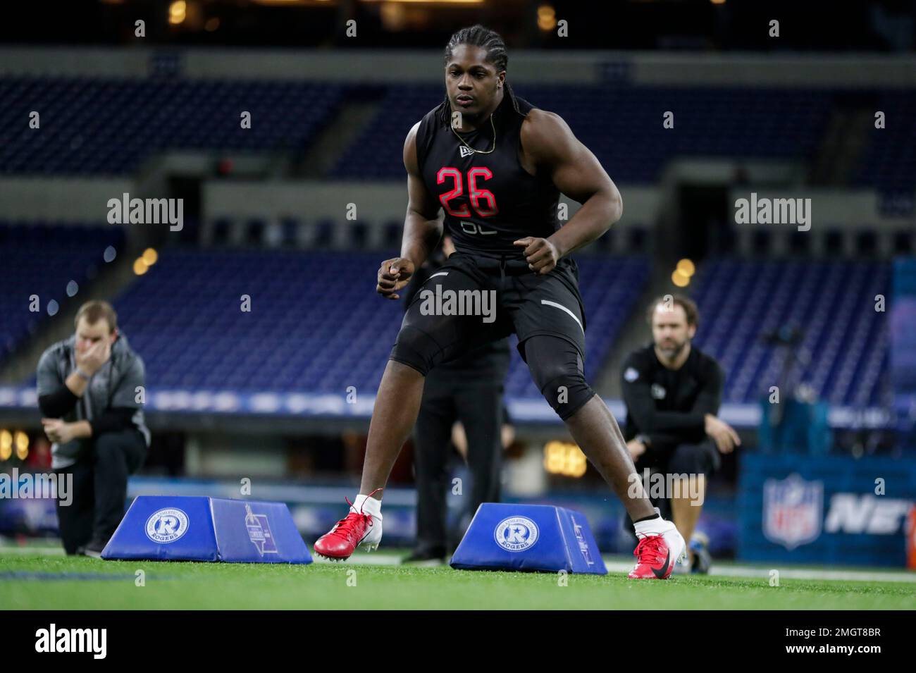 Miami defensive lineman Jonathan Garvin runs a drill at the NFL ...