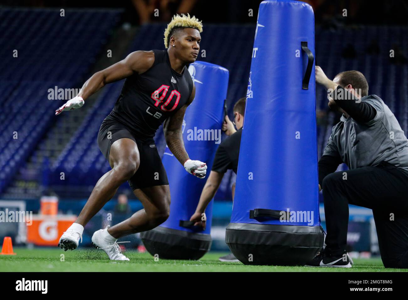 Fresno State linebacker Mykal Walker runs a drill at the NFL football ...