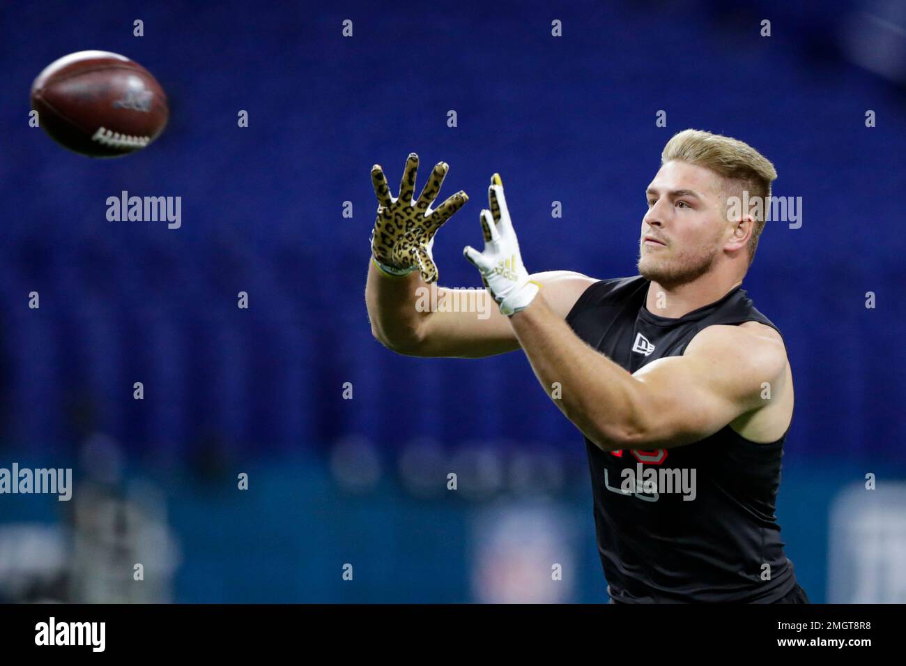 Wyoming linebacker Logan Wilson runs a drill at the NFL football ...