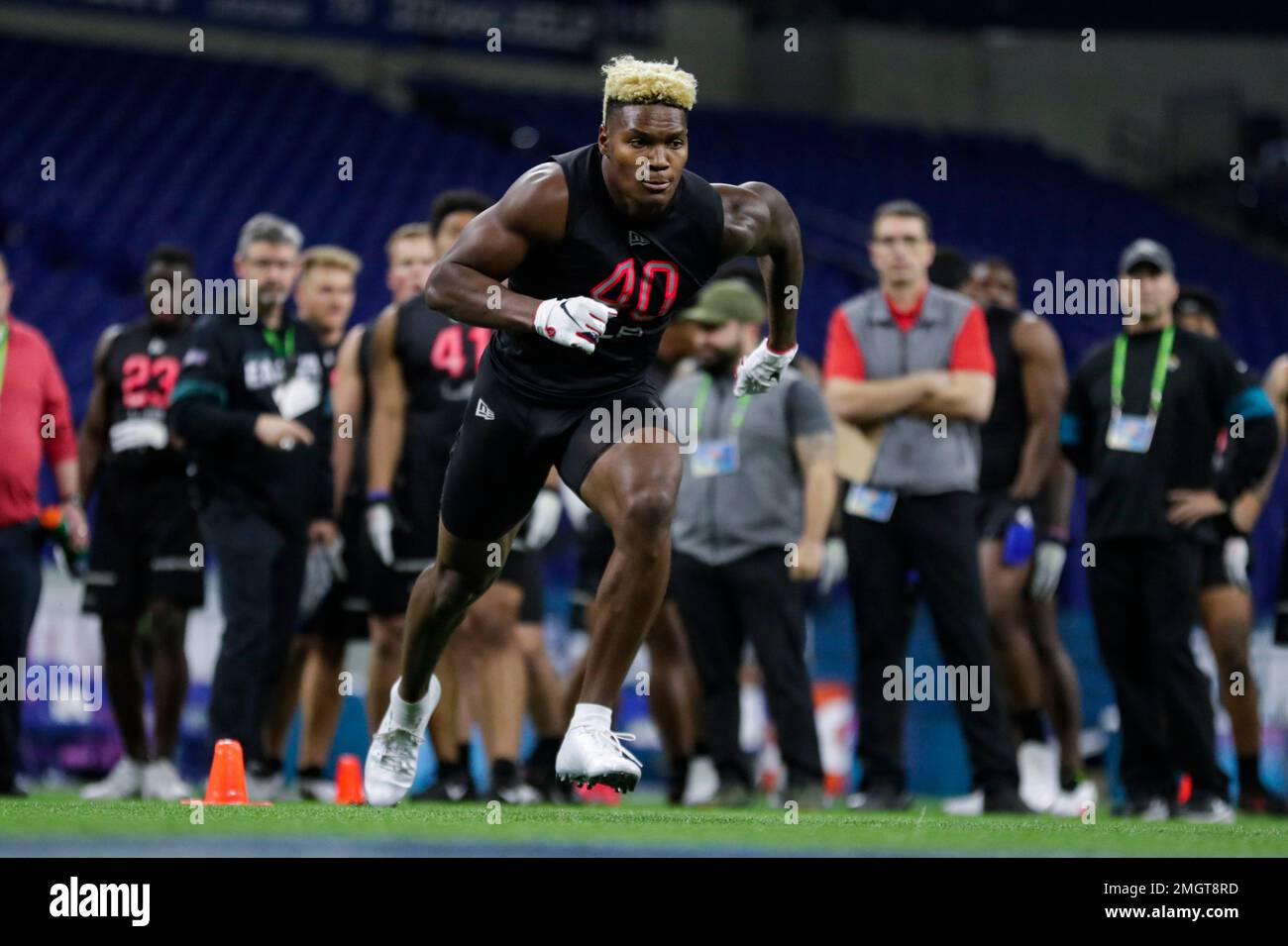 Fresno State linebacker Mykal Walker runs a drill at the NFL football ...