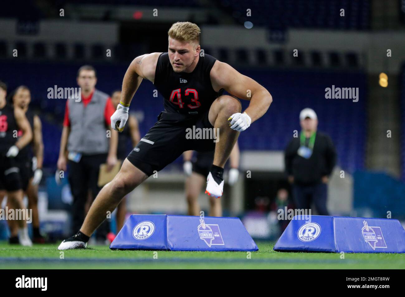 Wyoming linebacker Logan Wilson runs a drill at the NFL football ...