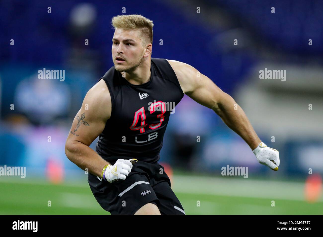 Wyoming linebacker Logan Wilson runs a drill at the NFL football ...