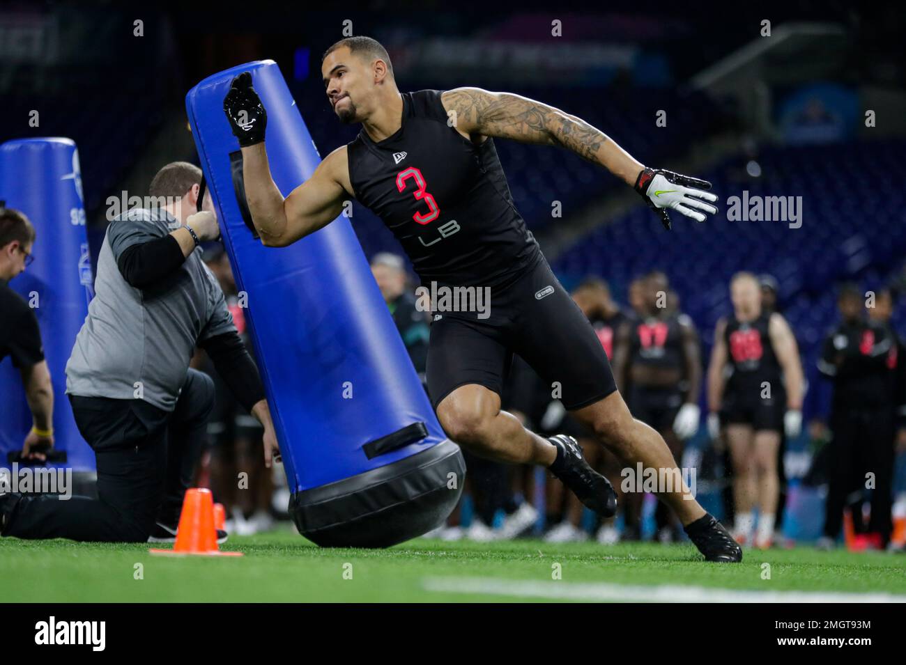 Wisconsin linebacker Zack Baun runs a drill at the NFL football ...