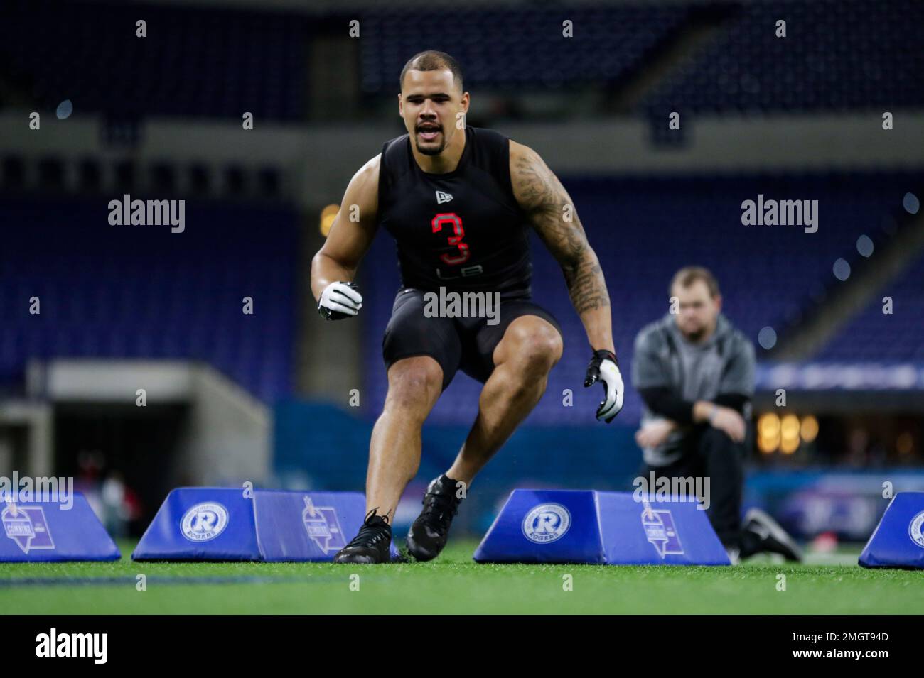 Wisconsin linebacker Zack Baun runs a drill at the NFL football ...