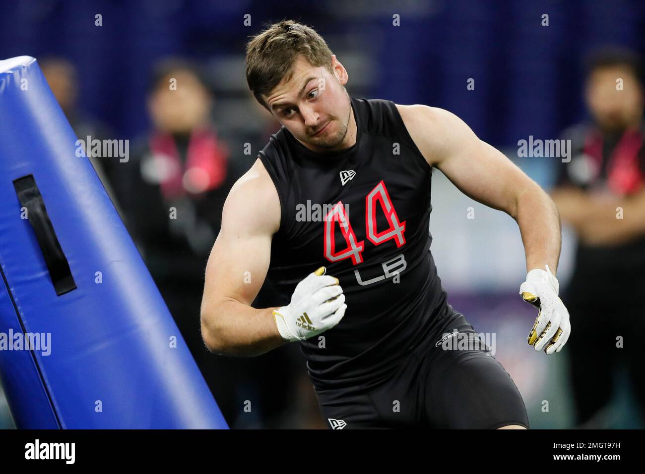 Utah State linebacker David Woodward runs a drill at the NFL football ...