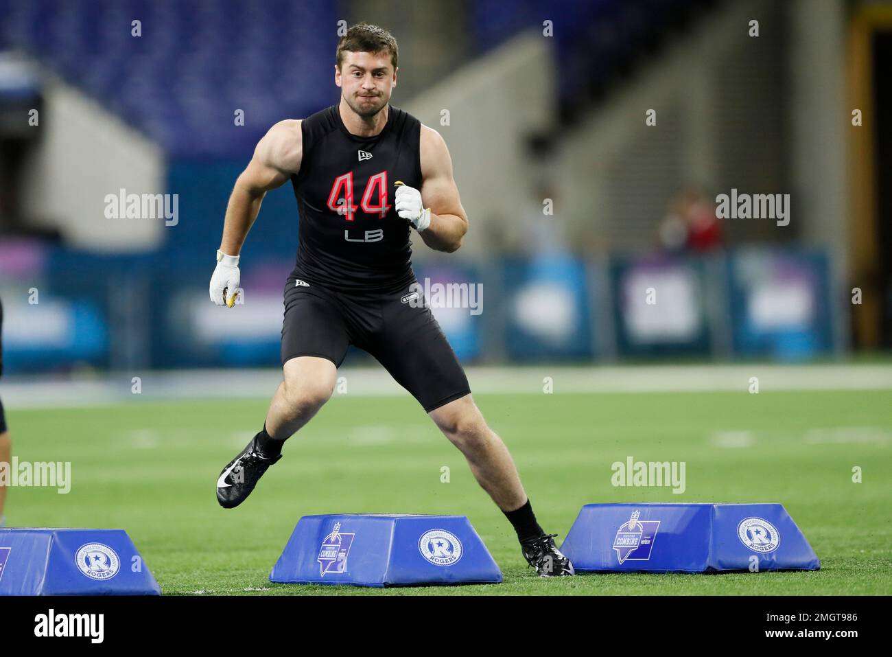 Utah State linebacker David Woodward runs a drill at the NFL football ...
