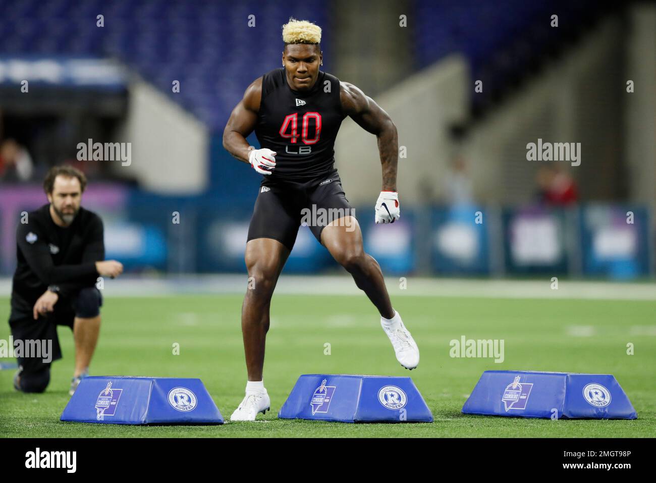 Fresno State linebacker Mykal Walker runs a drill at the NFL football ...