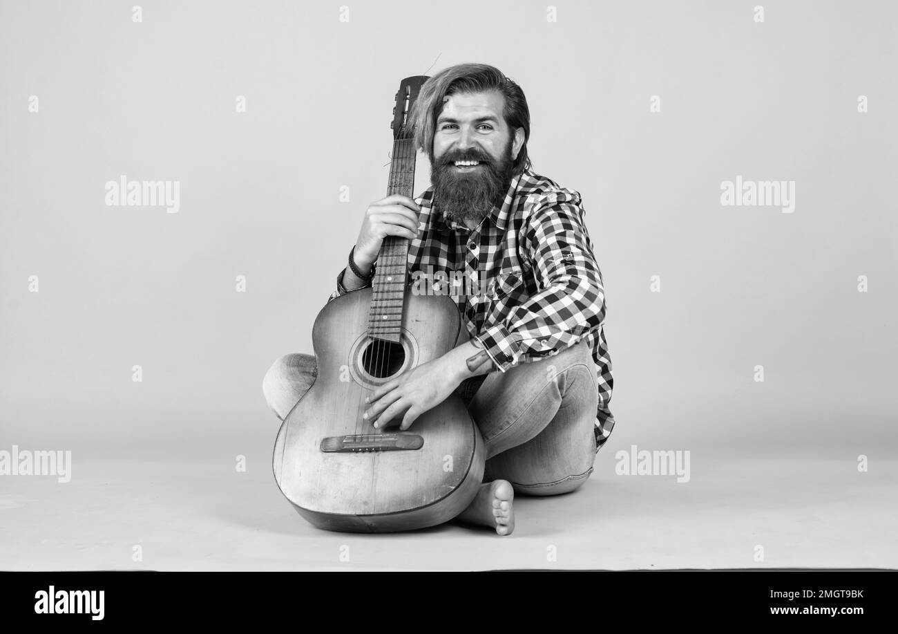 Rugged and manly. happy musician guitarist. charismatic mature man ...