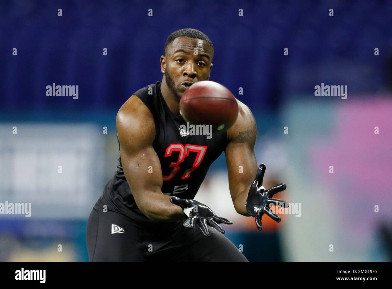 Colorado linebacker Davion Taylor runs a drill at the NFL football ...