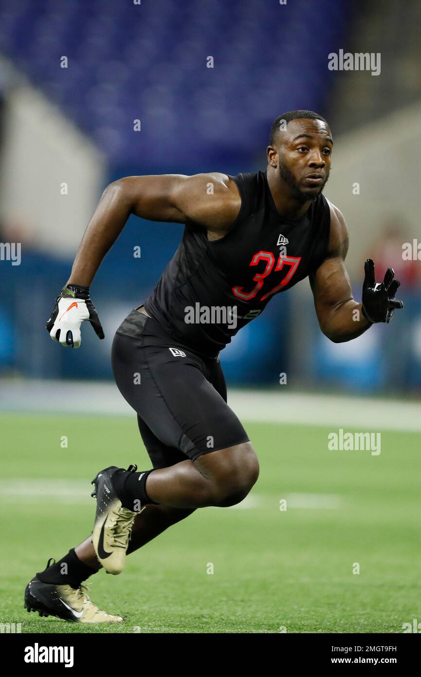 Colorado linebacker Davion Taylor runs a drill at the NFL football ...
