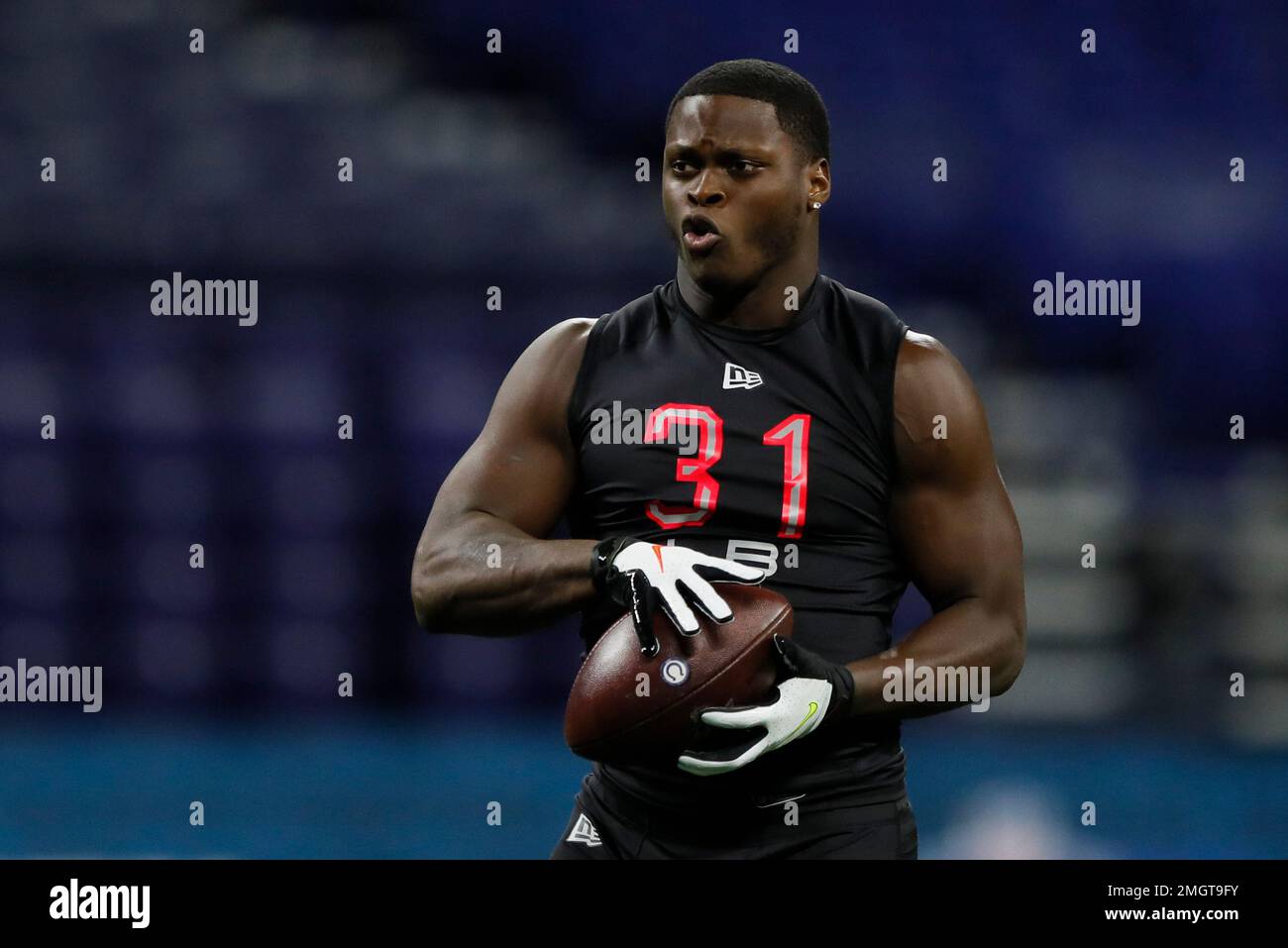 Miami linebacker Shaquille Quarterman runs a drill at the NFL football ...
