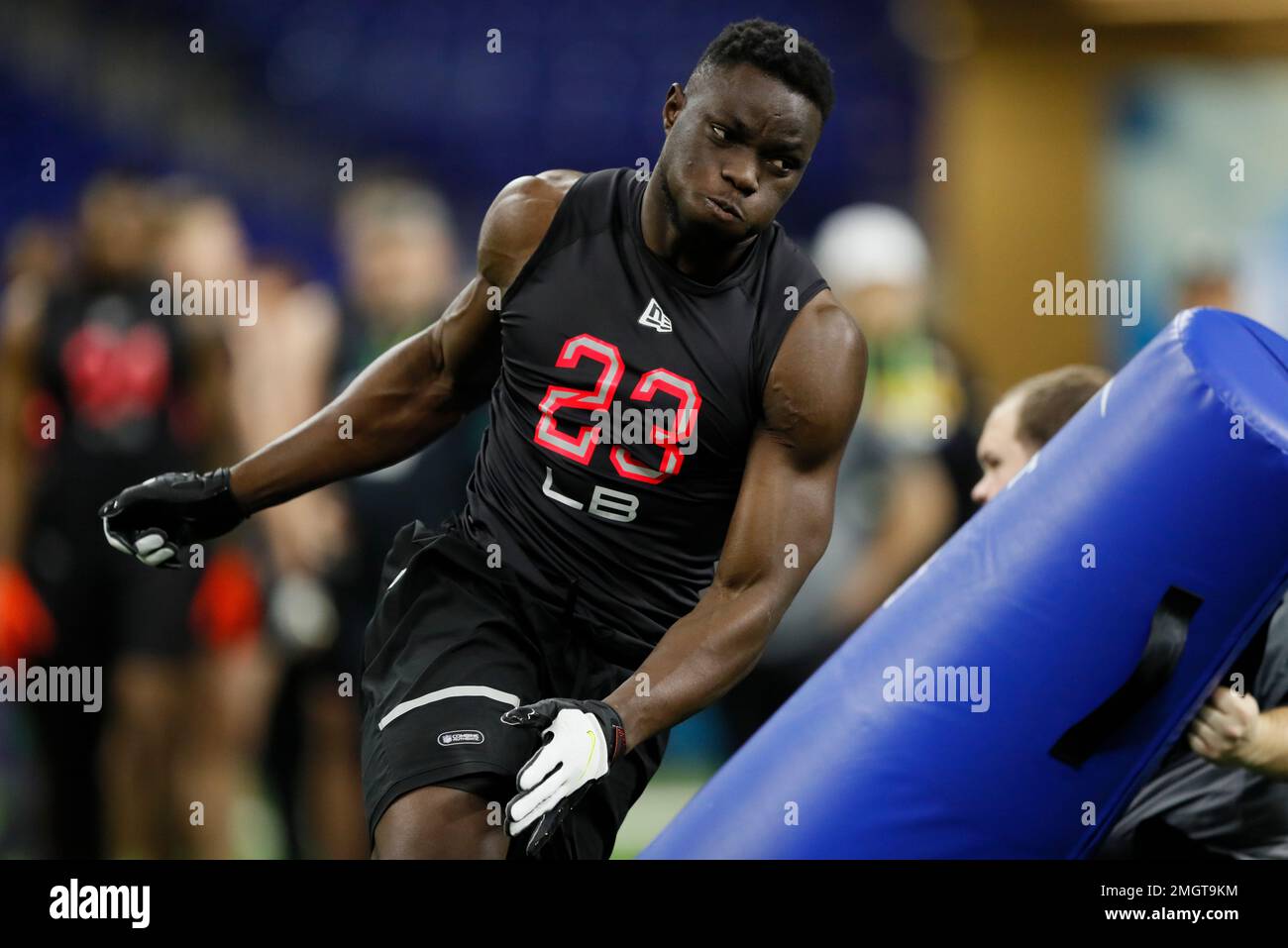 Kansas linebacker Azur Kamara runs a drill at the NFL football scouting ...