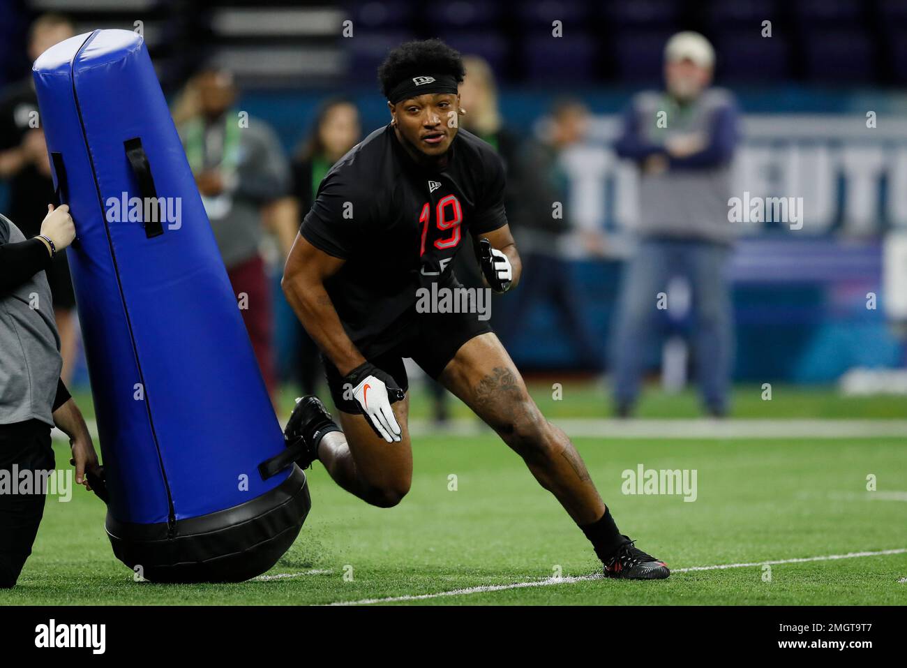 Ohio State linebacker Malik Harrison runs a drill at the NFL football ...