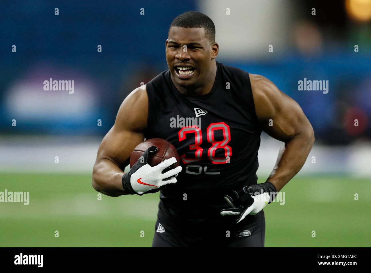 Syracuse defensive lineman Alton Robinson runs a drill at the NFL ...
