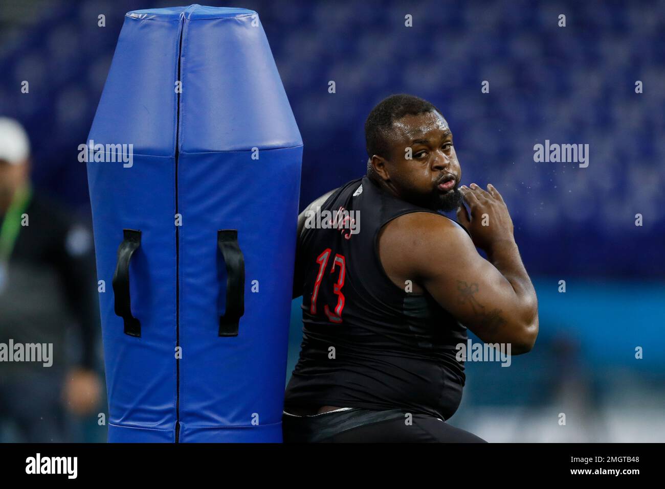 Mississippi defensive lineman Benito Jones runs a drill at the NFL ...
