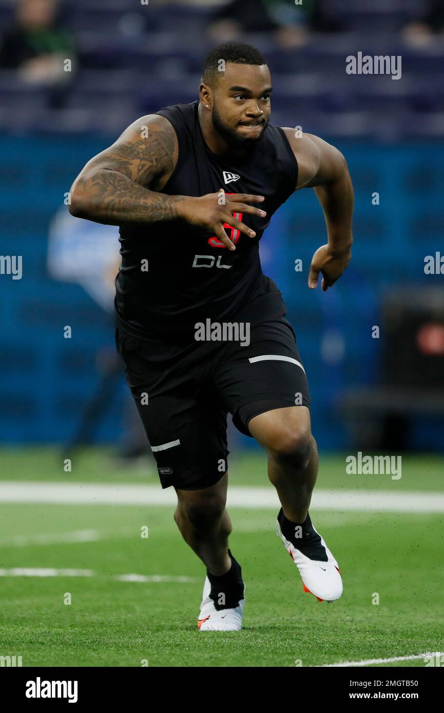 Missouri defensive lineman Jordan Elliott runs a drill at the NFL ...