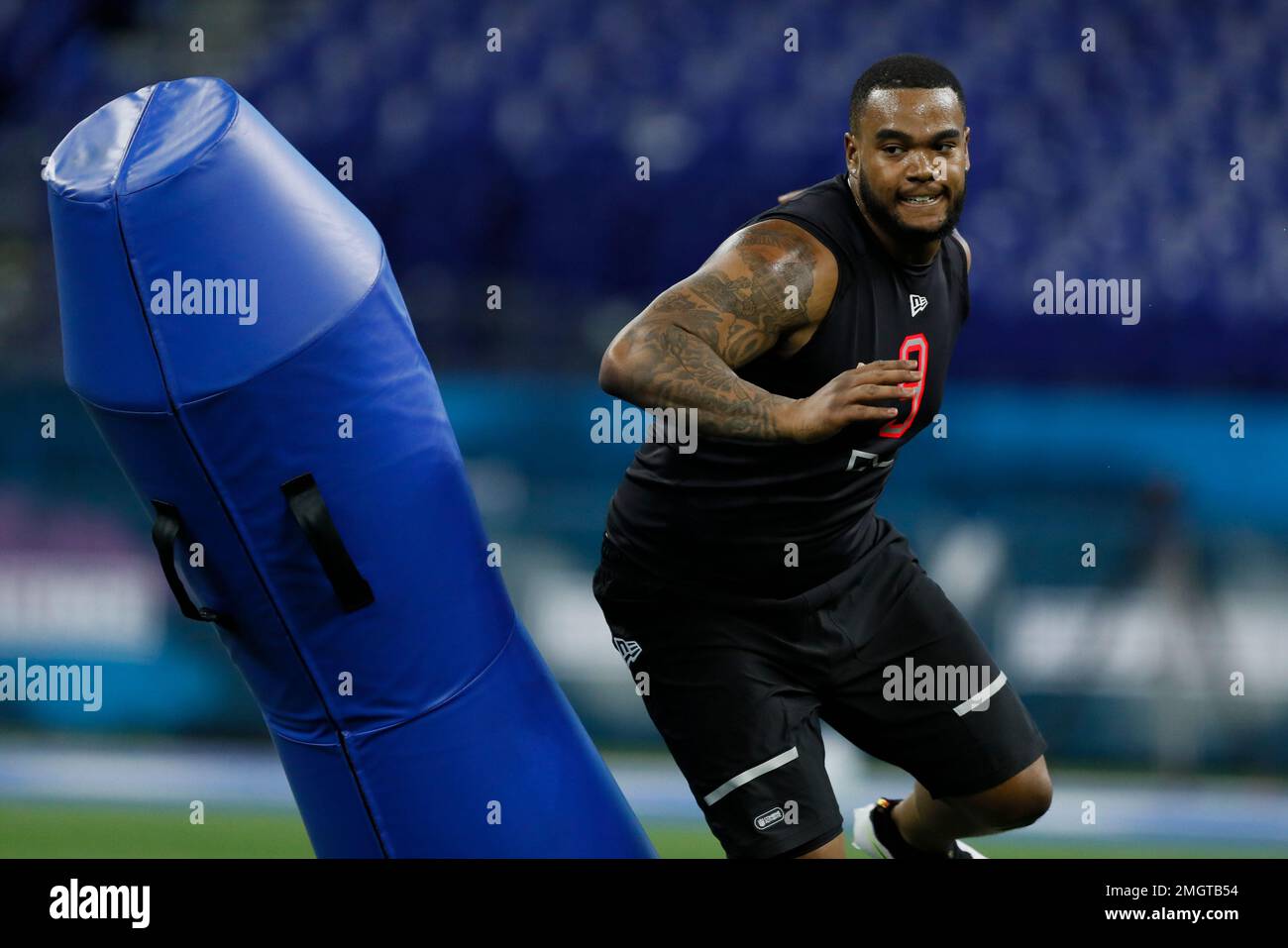 Missouri defensive lineman Jordan Elliott runs a drill at the NFL ...