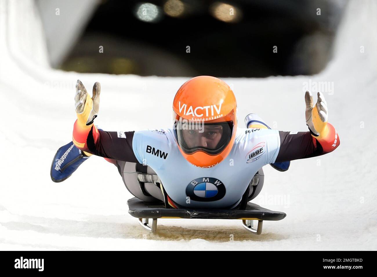 Tina Hermann of Germany gestures as she arrives at the finish area ...