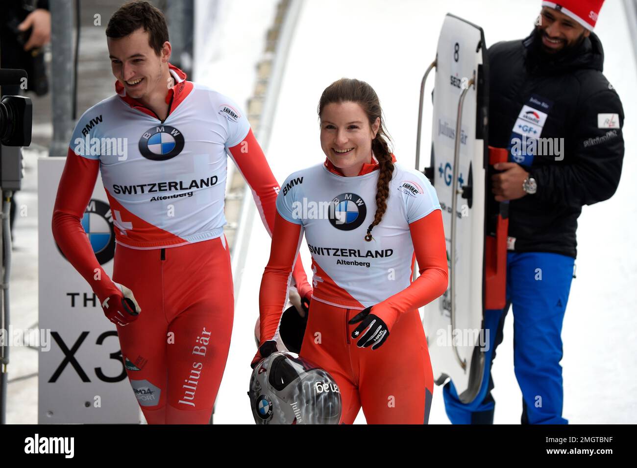 Marina Gilardoni and Basil Sieber of Switzerland arrive at the finish ...