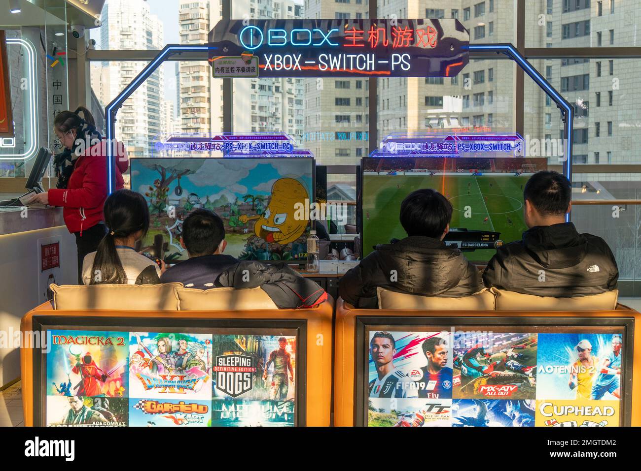 SHANGHAI, CHINA - JANUARY 26, 2023 - Young people play a game at a game ...