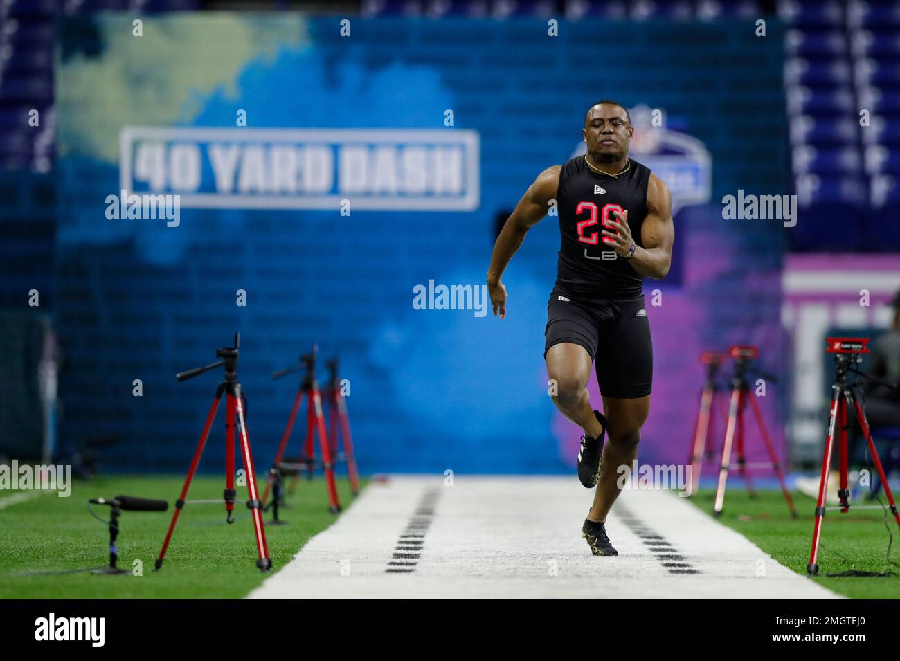 LSU linebacker Jacob Phillips runs the 40-yard dash at the NFL football ...