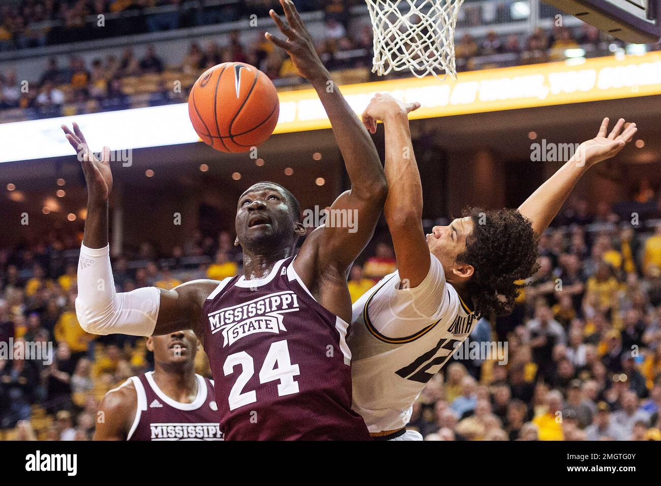 Mississippi State's Abdul Ado, left, and Missouri's Dru Smith, right ...