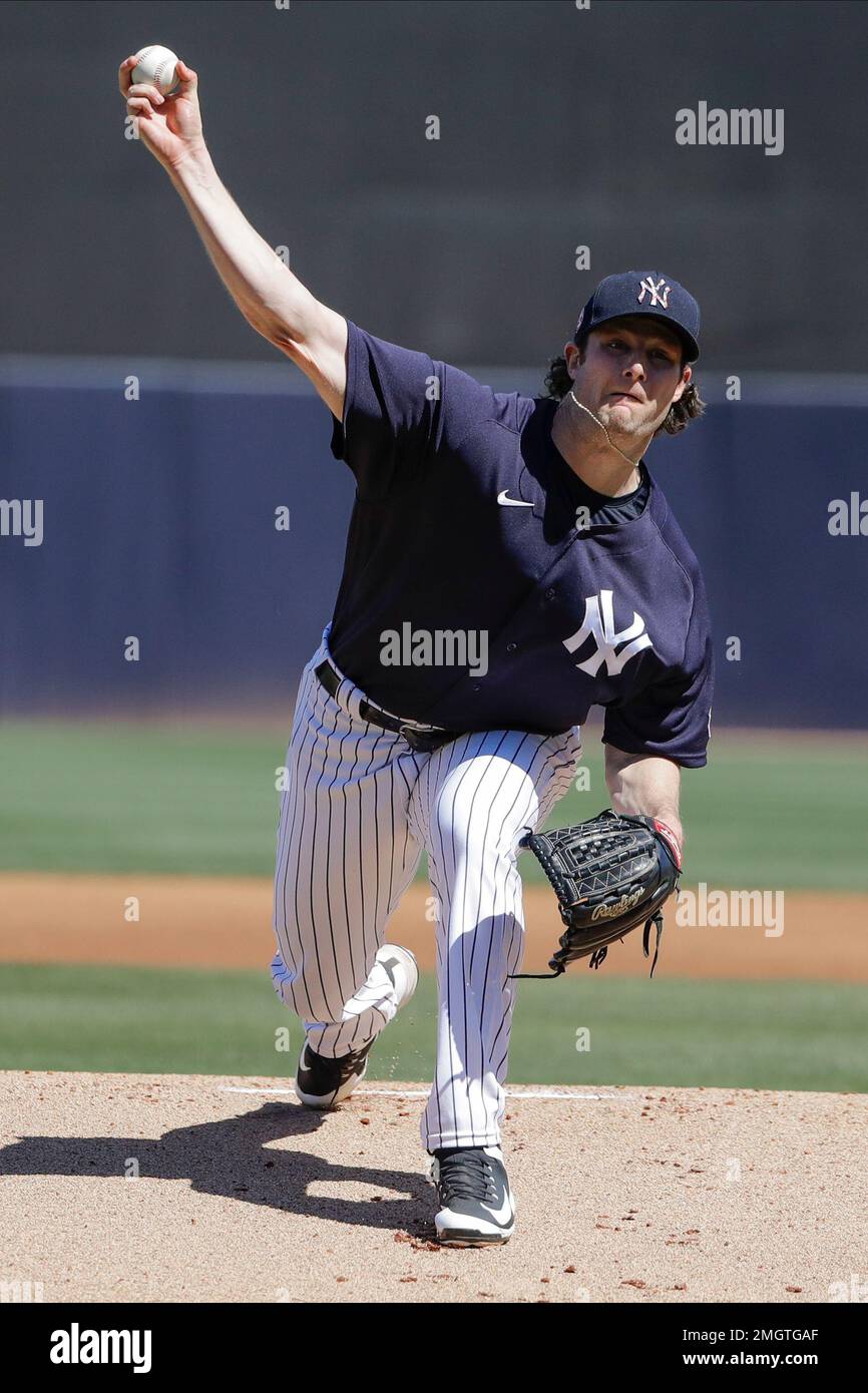 New York Yankees' Gerrit Cole warms up before of a spring training ...