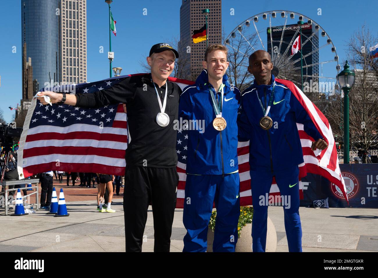 First place finisher Galen Rupp, center second place finisher Jacob ...