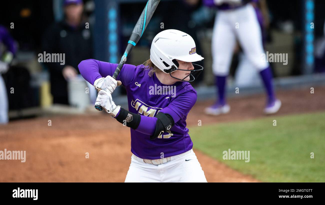James Madison's Emily Phillips (15) bats during an NCAA softball game ...