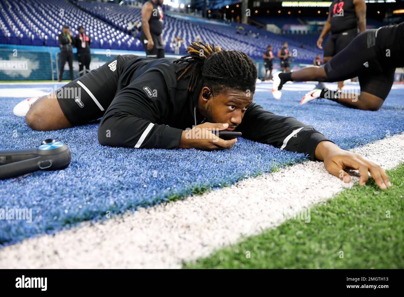 Ohio State defensive lineman Davon Hamilton stretches at the NFL ...