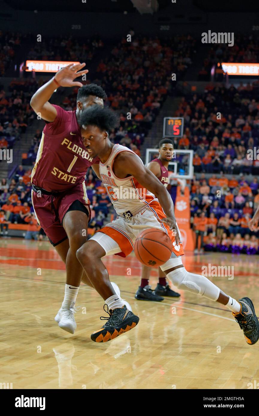 Clemson's John Newman lll, right, drives while defended by Florida ...