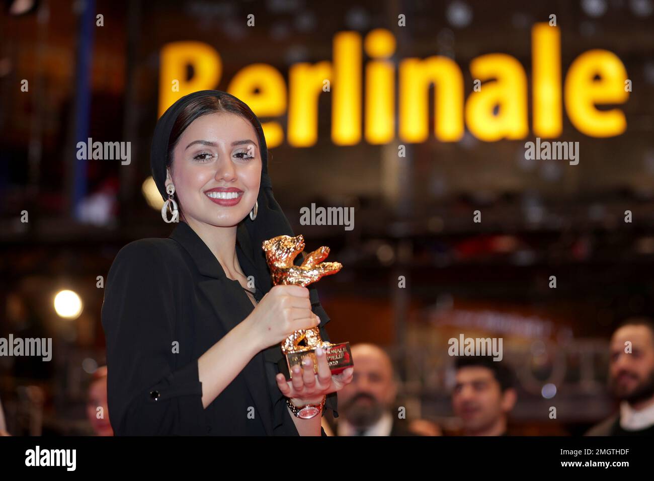 Actress Baran Rasoulof, holds The Golden Bear for Best Film in place of ...