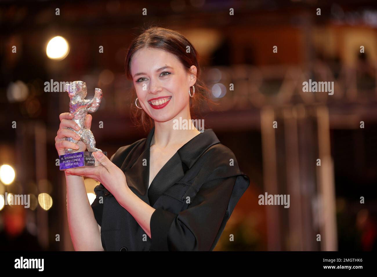Actress Paula Beer holds The Silver Bear for Best Actress for the film 'Undine' after the award ...