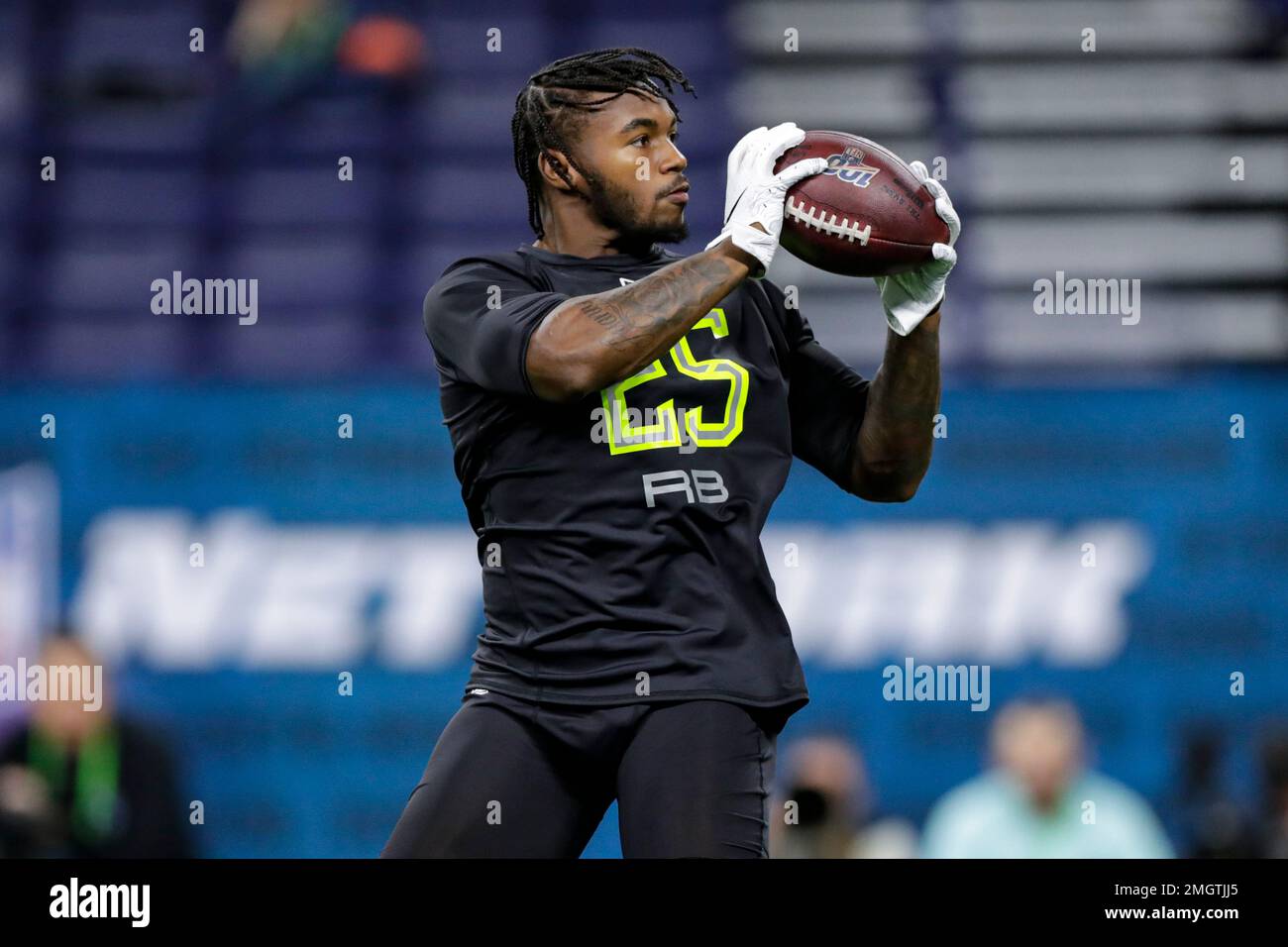 Georgia running back D'Andre Swift runs a drill at the NFL football ...