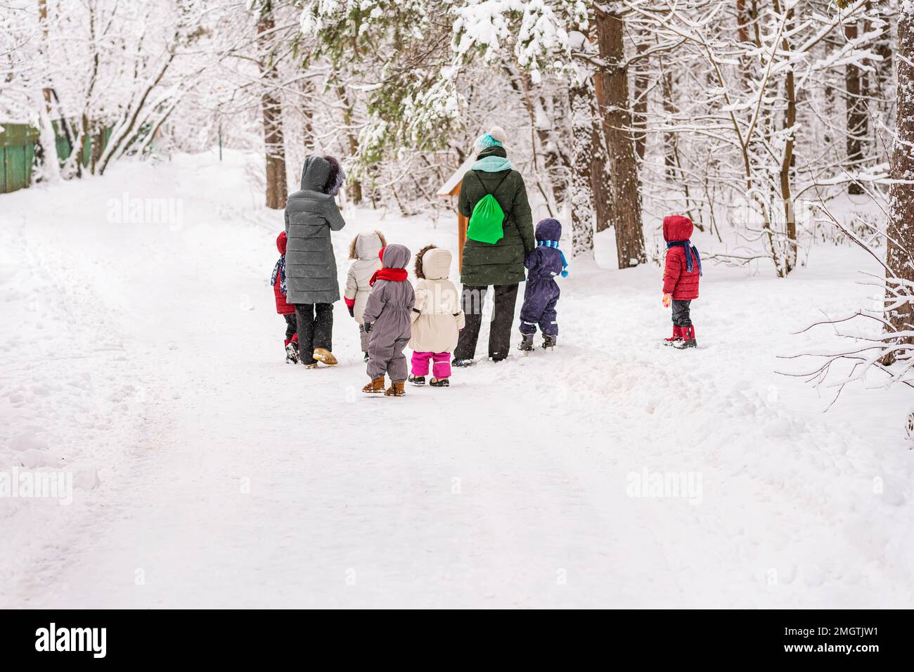 Winter. Cute preschoolers group of kindergarten and 2 kindergarten ...