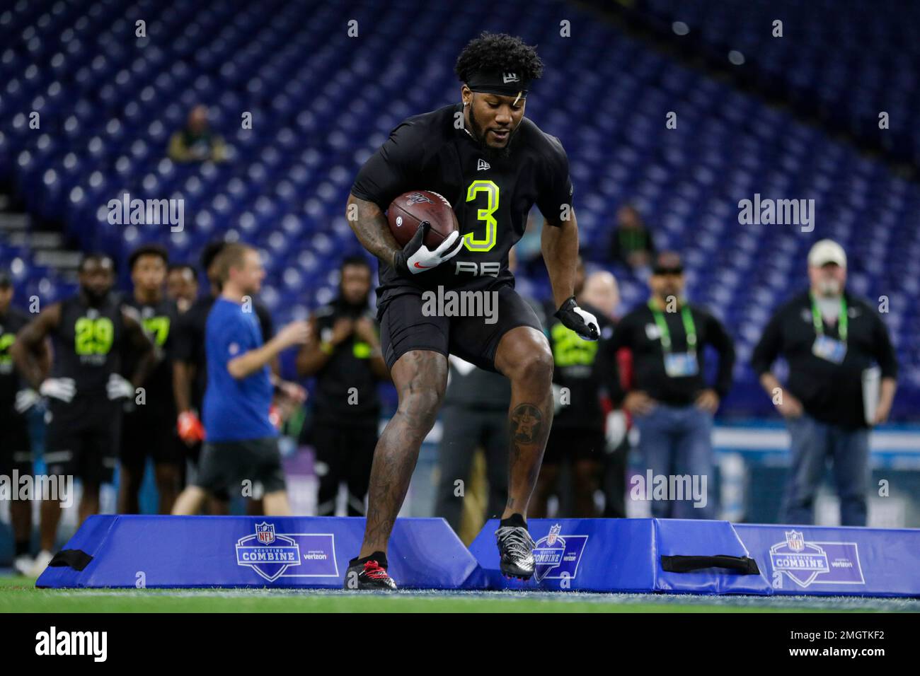 TCU running back Jet Anderson runs a drill at the NFL football scouting ...
